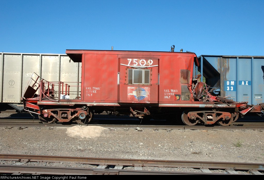 MP 7509, CA-33 Bay Window Caboose, after a mishap with locomotive UP 9366